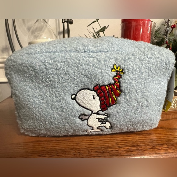 Peanuts | Bags | Nwtpeanuts Sherpa Pouch With Snoopy Ice Skating | Poshmark
